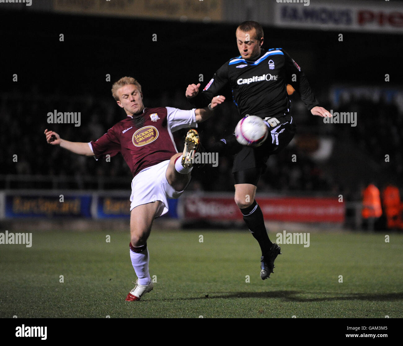 Northampton Town's Danny Jackman and Nottingham Forest's Sammy Clingan ...