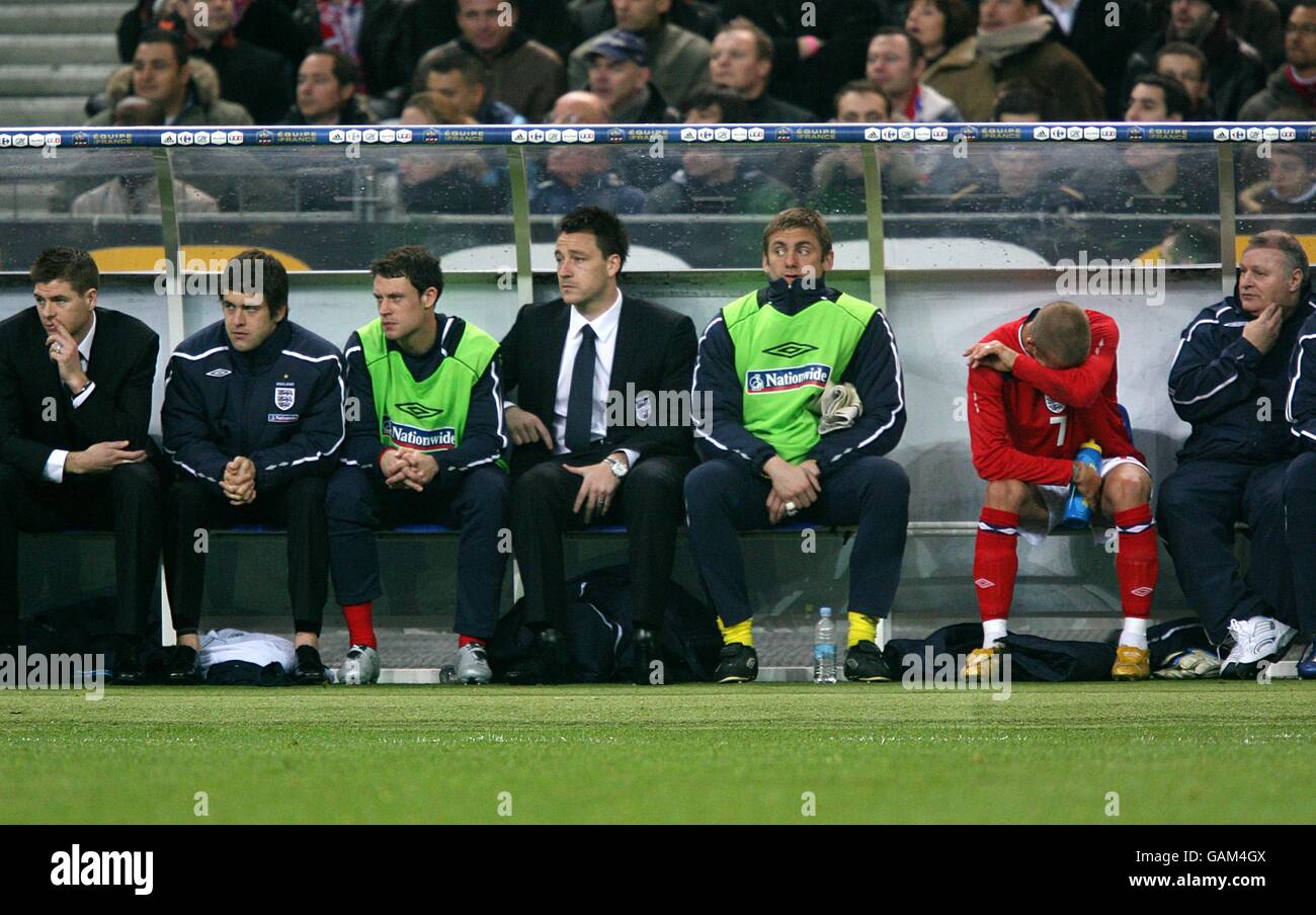 David Beckham (right) on the bench after being substituted during his ...