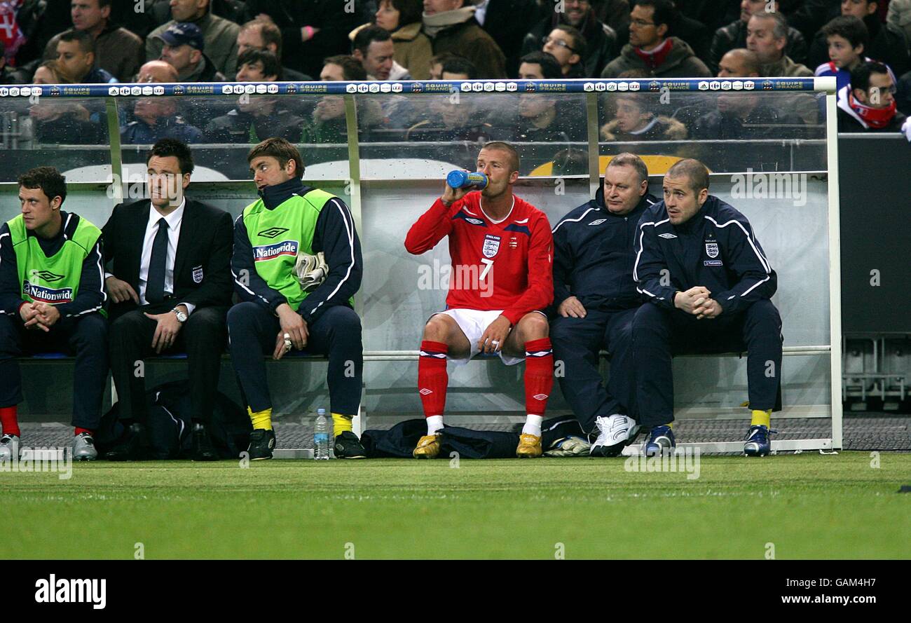 David Beckham on the bench after being substituted during his 100th cap ...