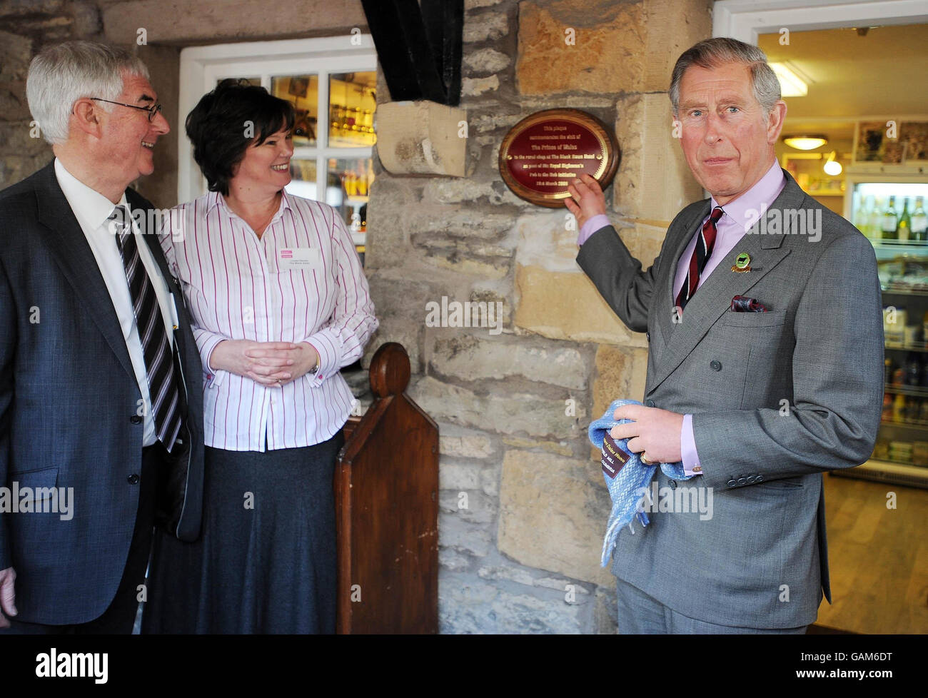 Prince Charles unveils a plaque at the village shop in Ravenstonedale ...
