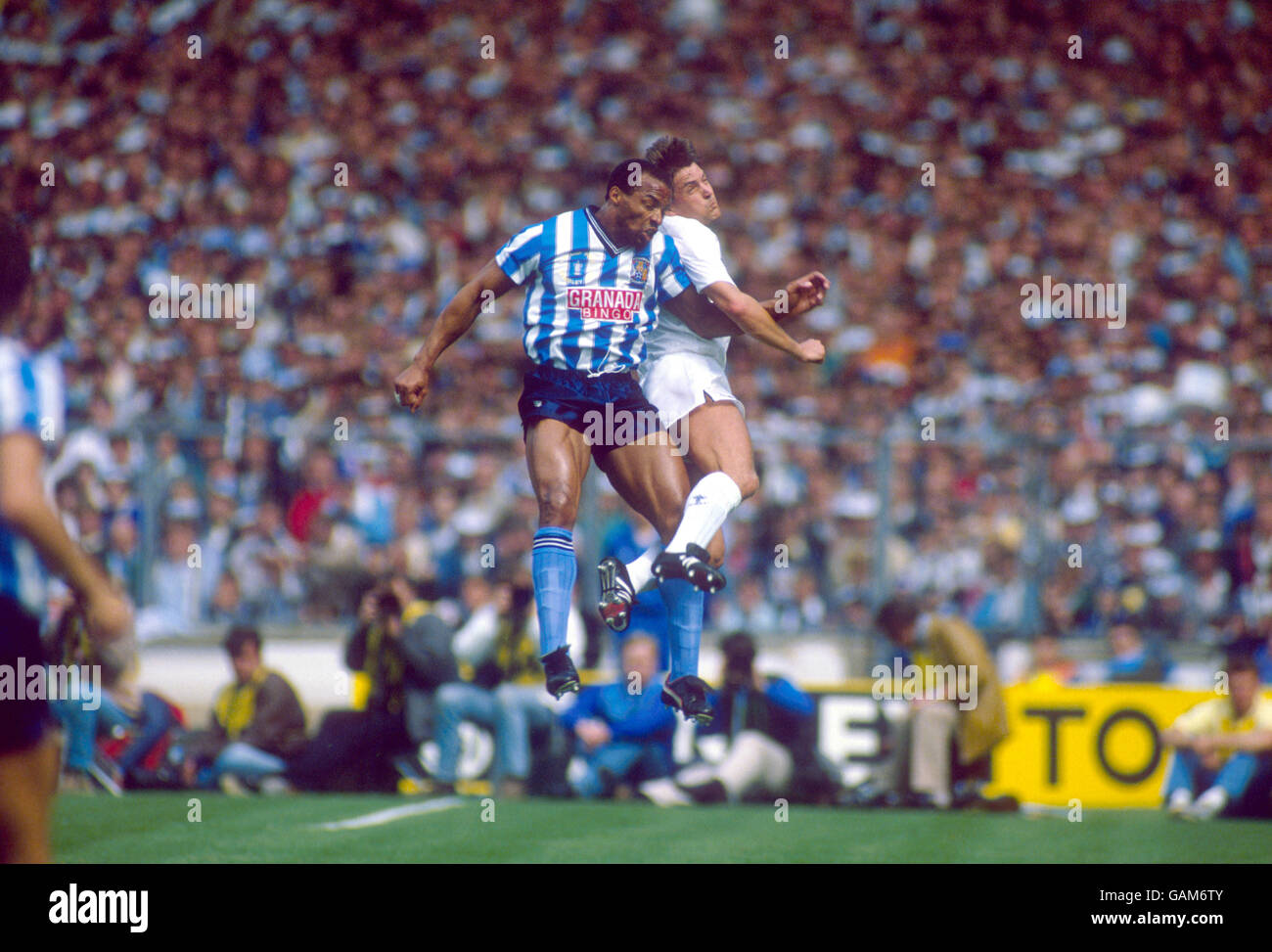 (L-R) Coventry City's Cyrille Regis contests a header with Tottenham ...