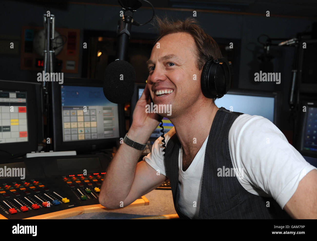 Jason Donovan poses during a photocall at the Capital FM studios in ...