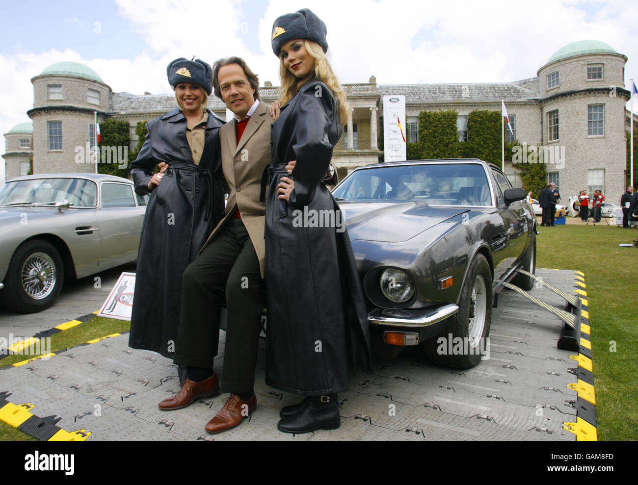 Lord March poses with two 'Bond Girls' in front of Goodwood House near ...