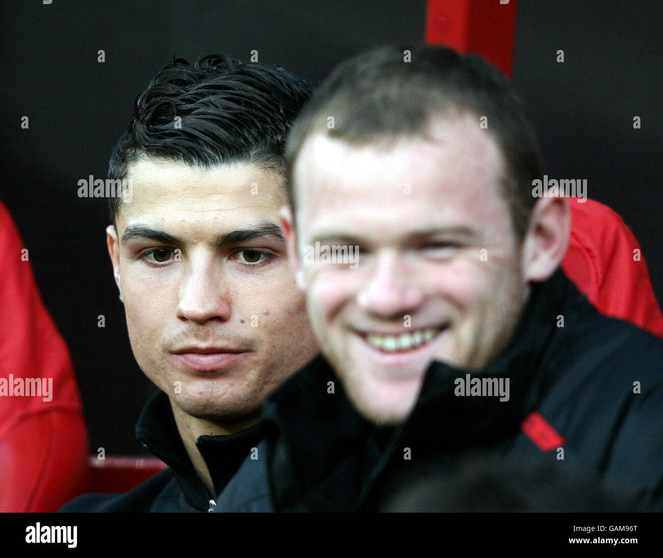Manchester uniteds cristiano ronaldo left wayne sit on the bench hi-res ...