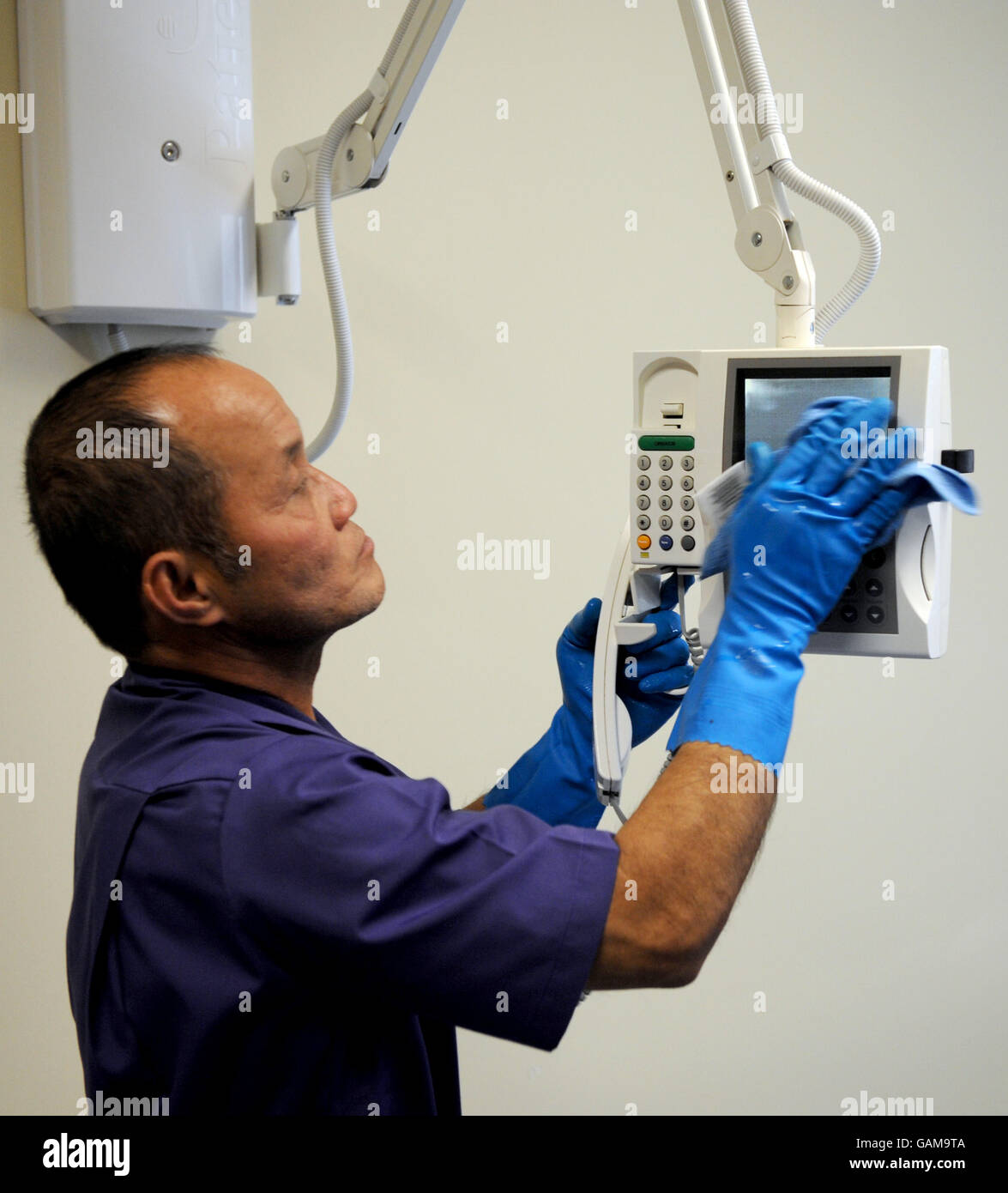 Stock images of a Deep Clean team cleaning a hospital room at the Royal ...