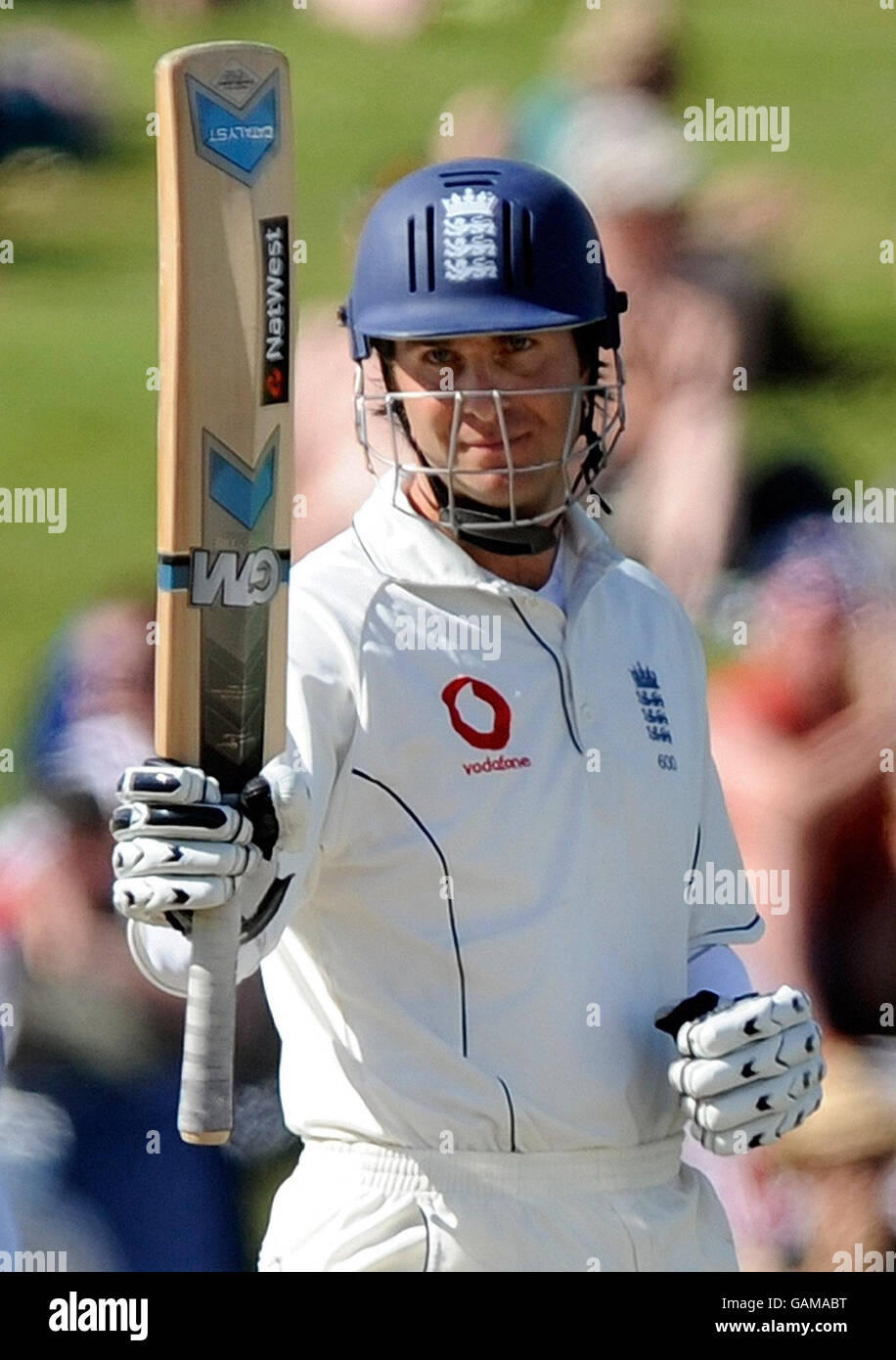 Cricket batsman raising bat hi-res stock photography and images - Alamy