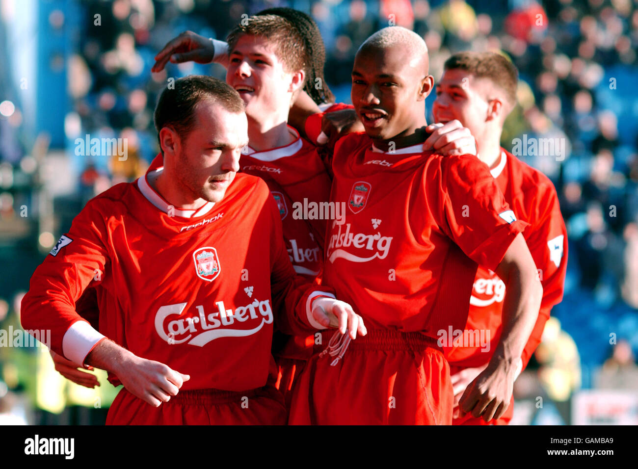 l-r Liverpool' Danny Murphy celebrates with Neil Mellor, El Hadji Diouf ...