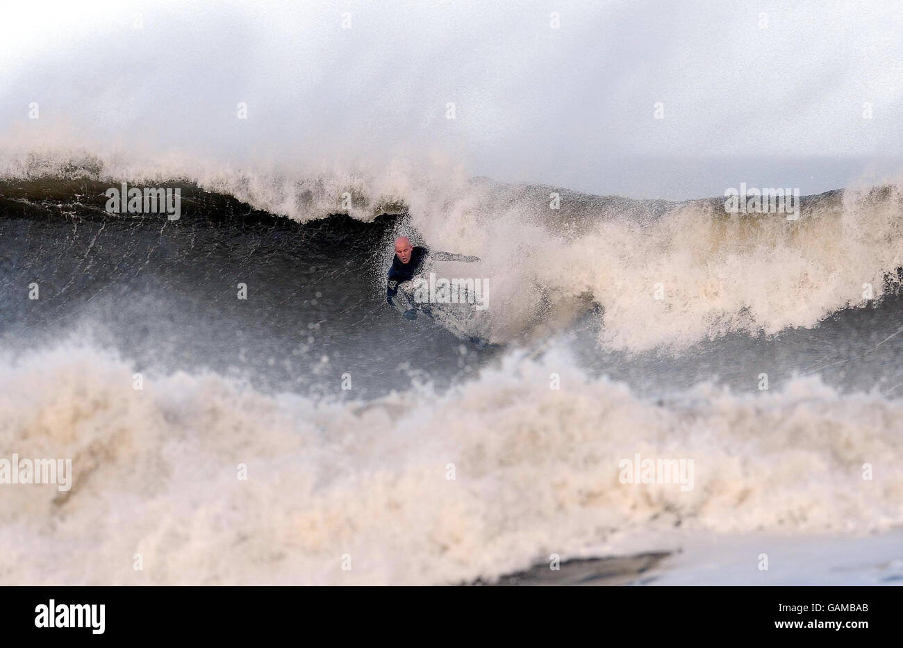 Surfers enjoy the huge surf at Tynemouth as stormy winds are forecast ...