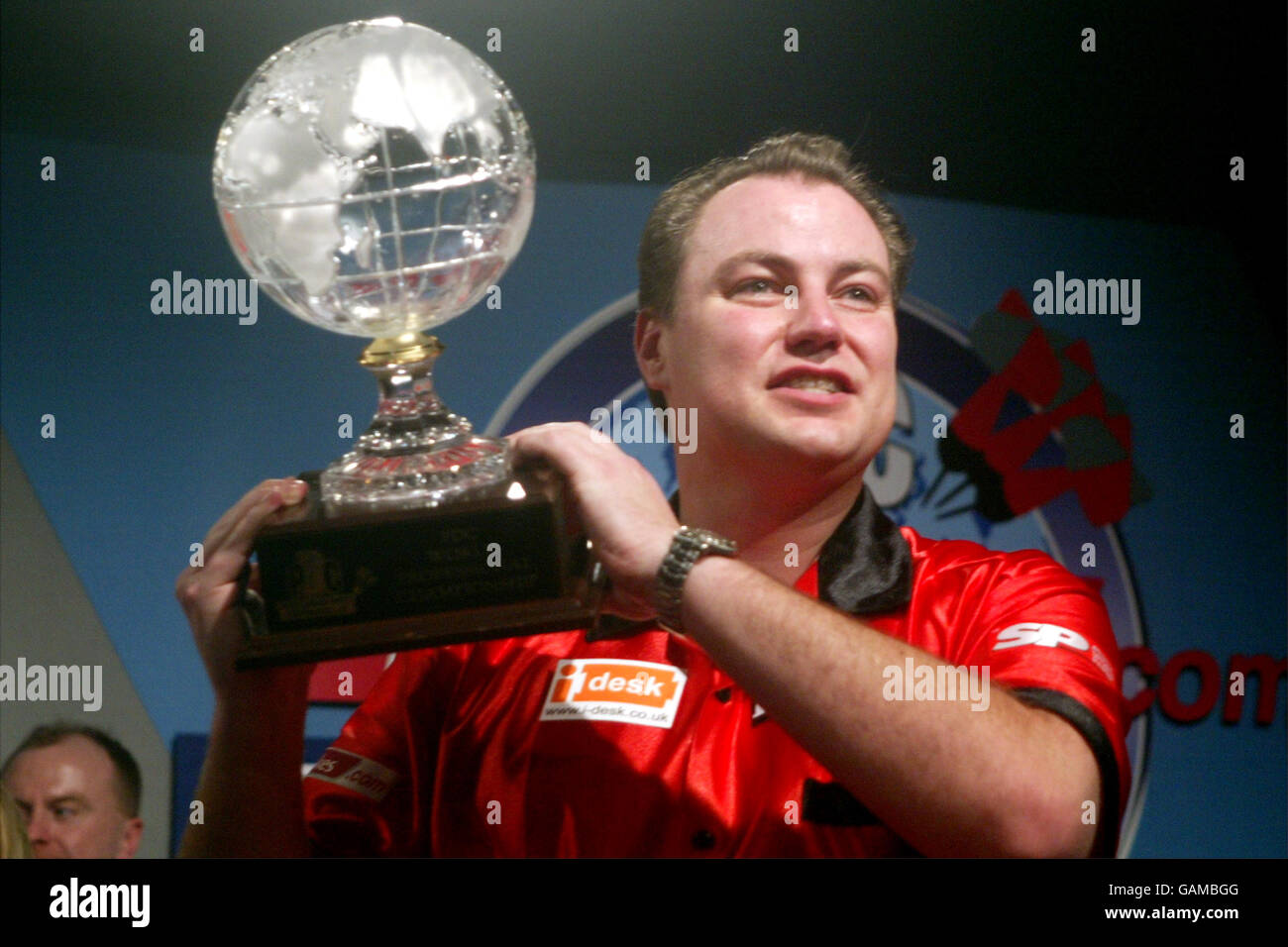 Phil taylor celebrates with the trophy hi-res stock photography and ...