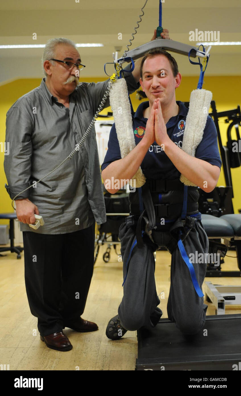 Paralysed man back on feet Stock Photo - Alamy