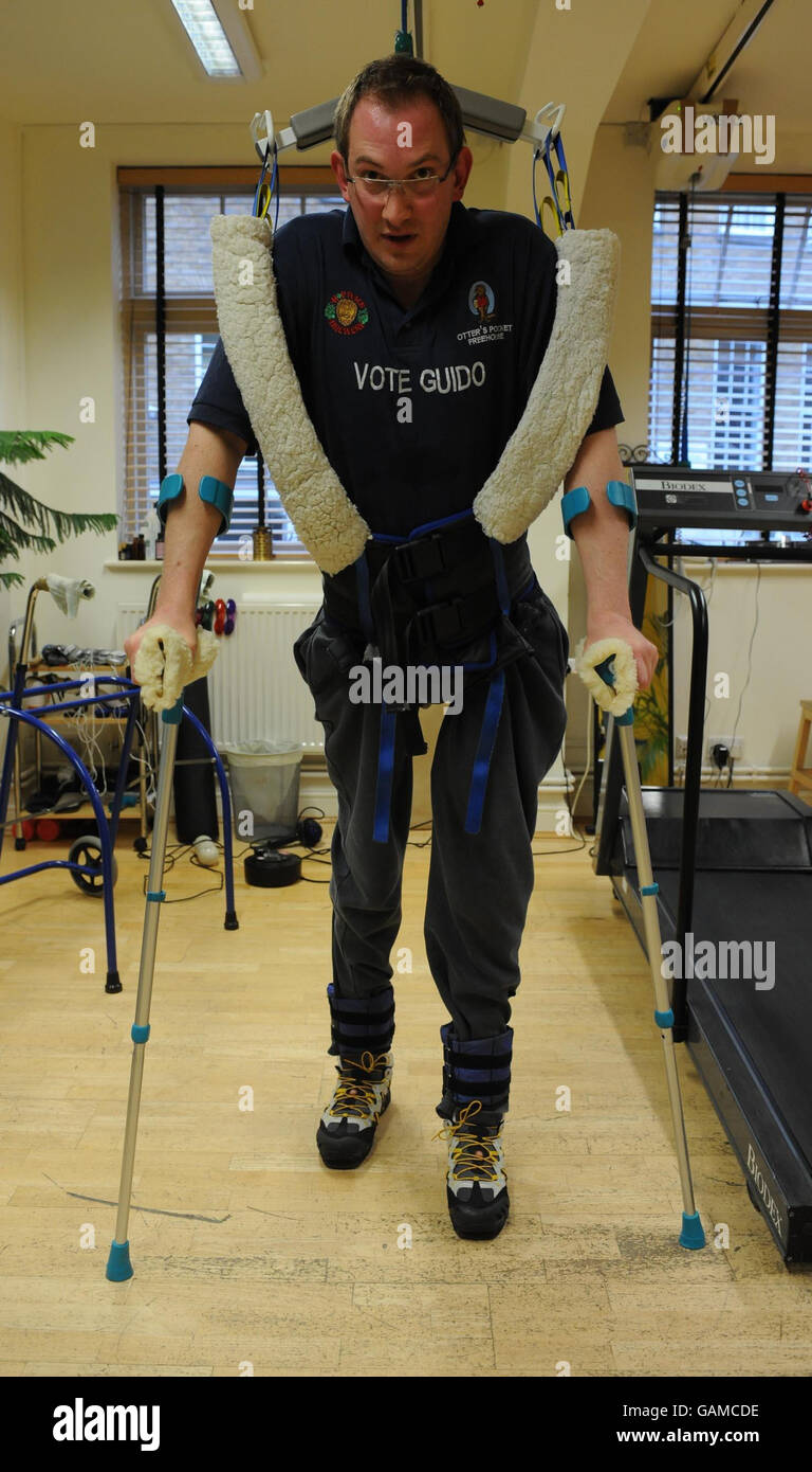 Paralysed man back on feet Stock Photo - Alamy