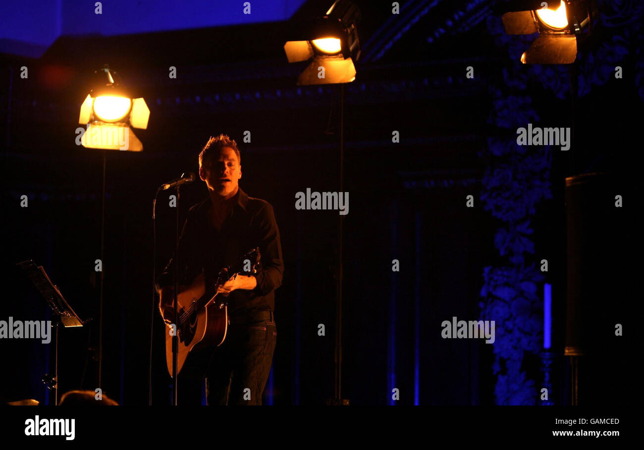 Bryan Adams in concert - London Stock Photo - Alamy