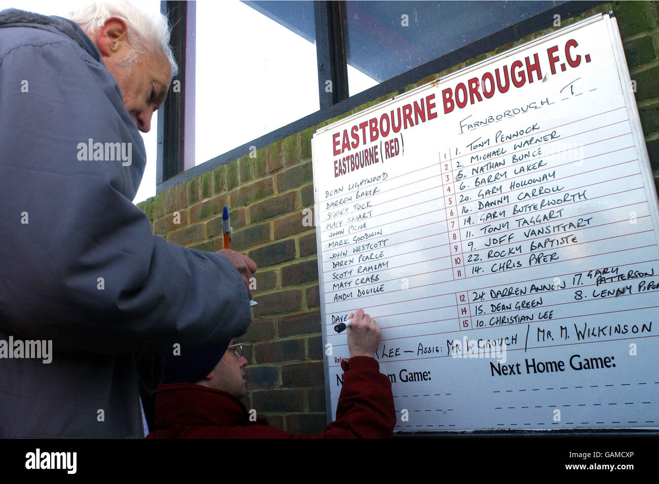 The teams for today's game is written on a whiteboard Stock Photo - Alamy