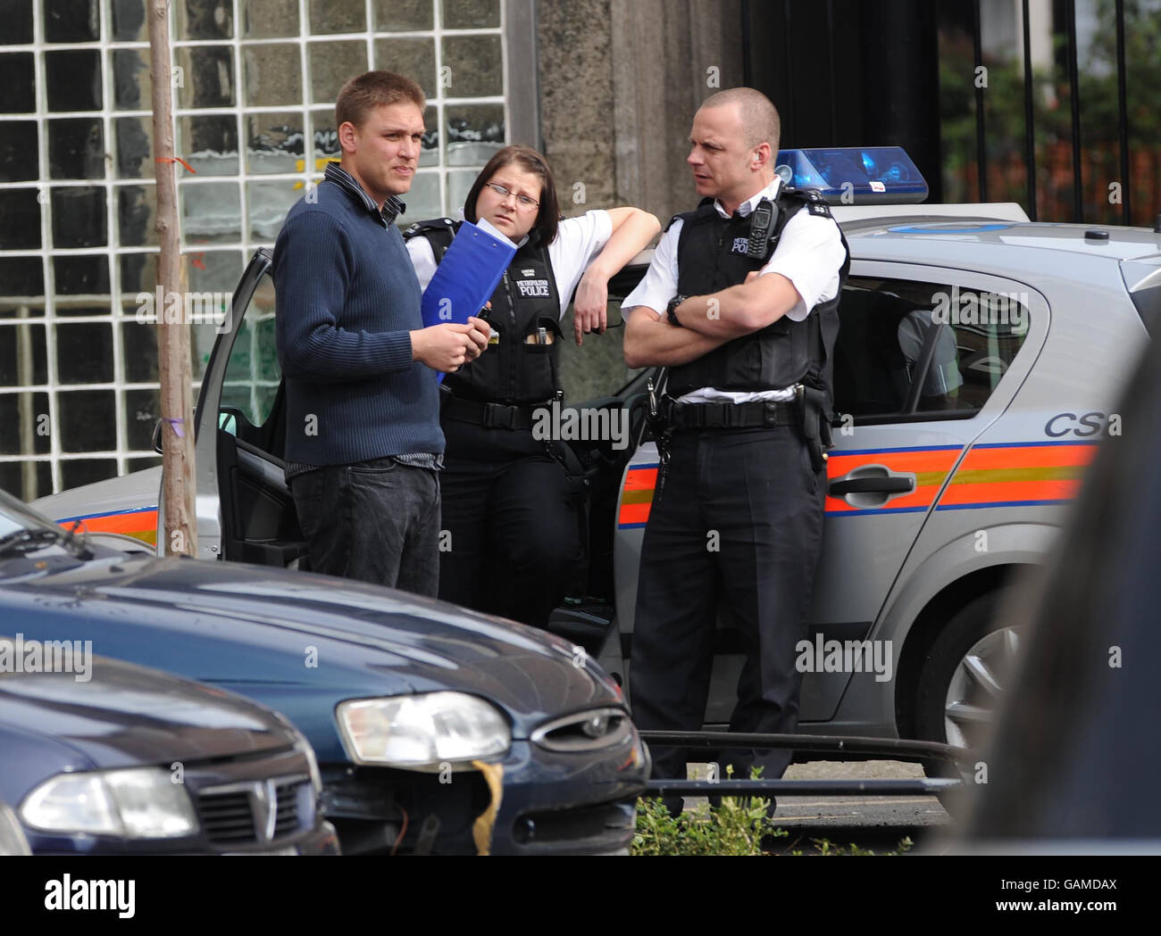 Police at the Badric estate, in Battersea, south London, where a police ...