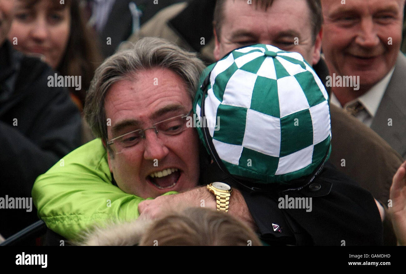 Harry Findlay, owner of Denman, congratulates jockey Sam Thomas after ...