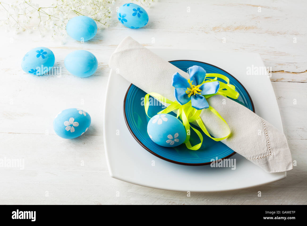 Blue Easter table place setting with plate, napkin and Blue Decorated ...