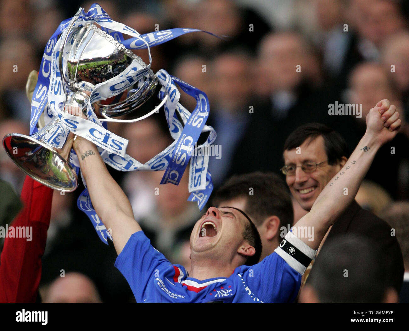 Rangers' Barry Ferguson celebrates with the trophy following their ...