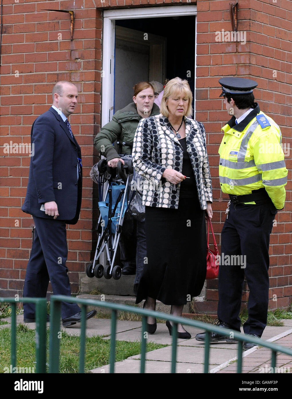 Karen Matthews (carrying pram) leaves her home in Moorside Road ...