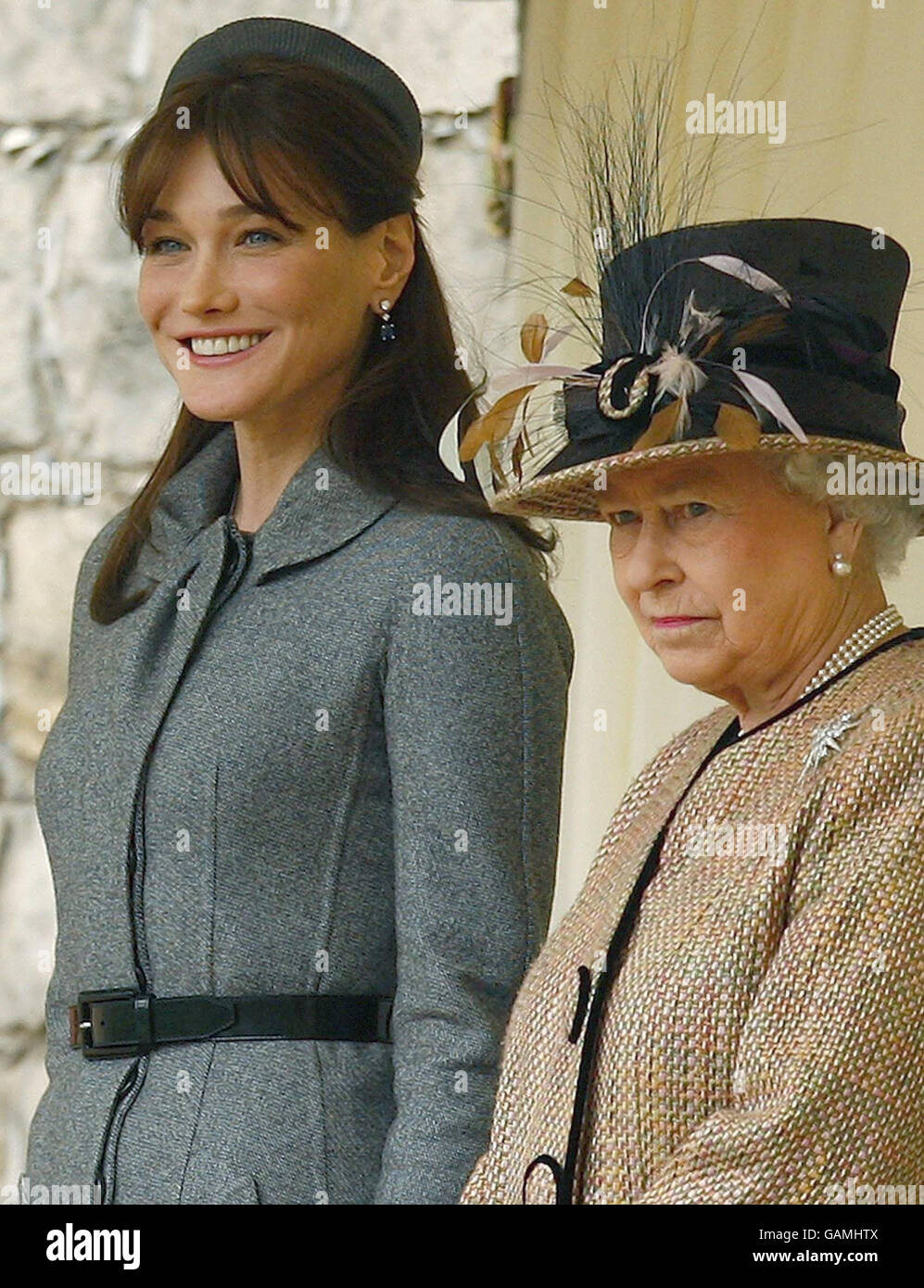 French first lady Carla Bruni and Queen Elizabeth II watch the Guard of ...