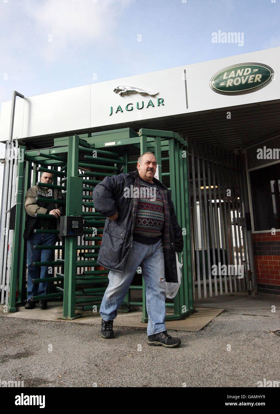 Employees leave the Landrover and Jaguar Halewood plant in Merseyside ...