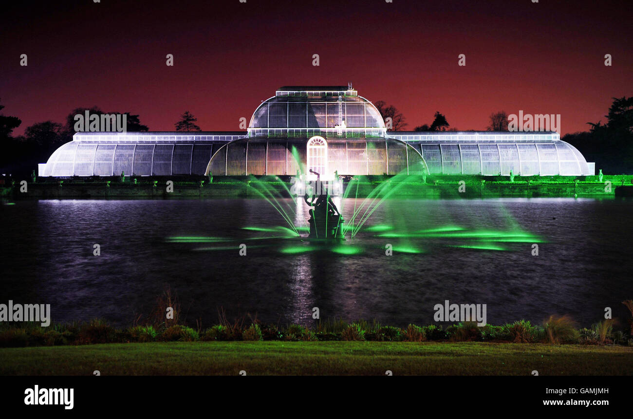 The Palm House, Kew Gardens, Surrey illuminated while the ardens opened ...