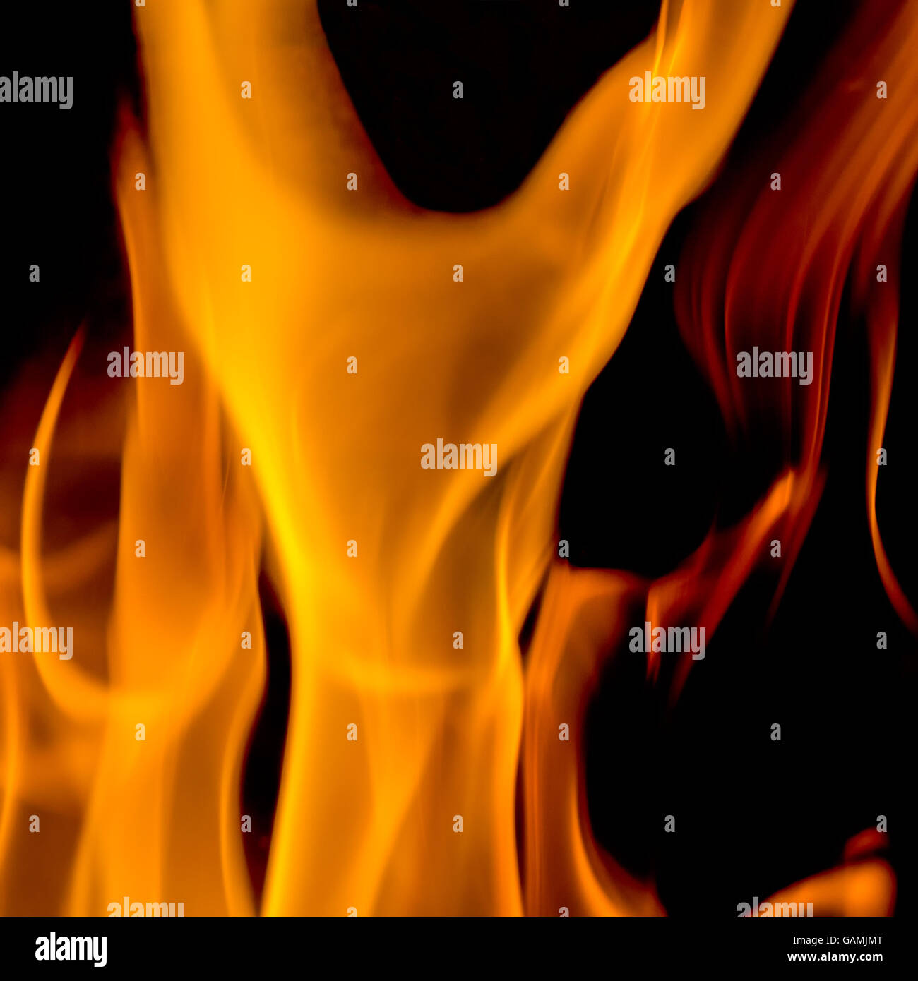 Fire flame having a shape like a dress on black Stock Photo - Alamy