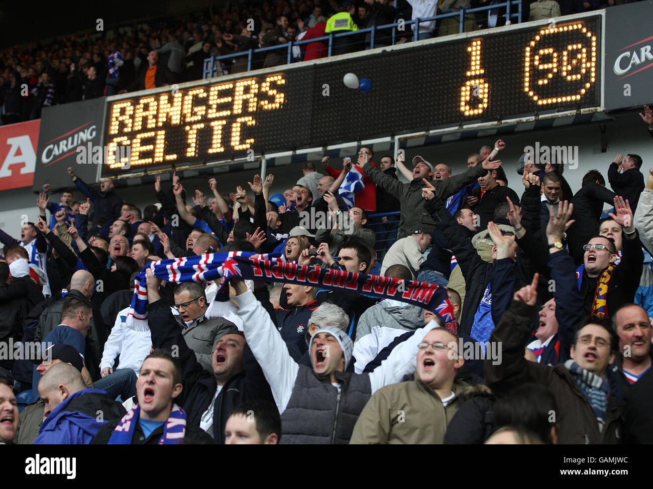 Rangers fans celebrate victory in the stands after the final whistle ...