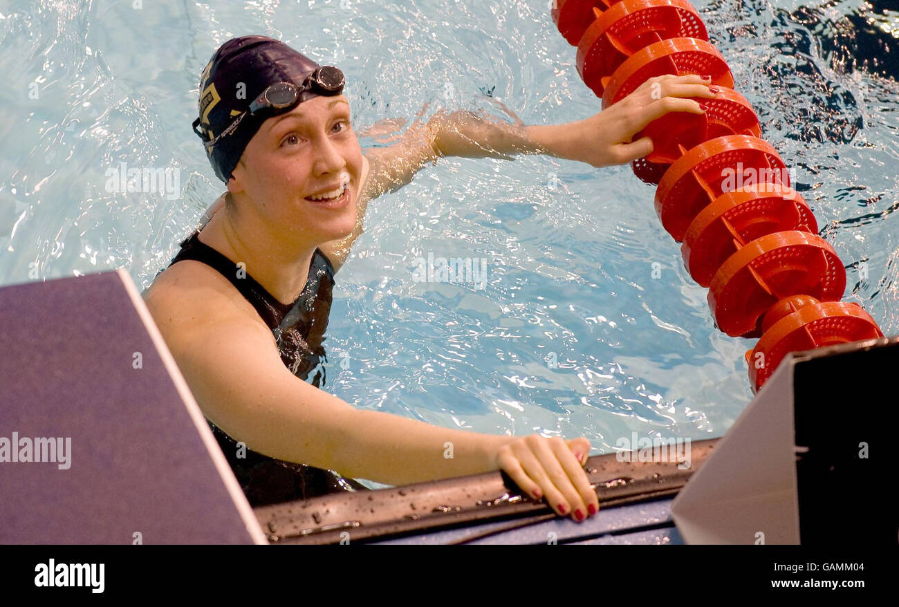 Elizabeth Simmons looks up at her time after competing in the Women's ...