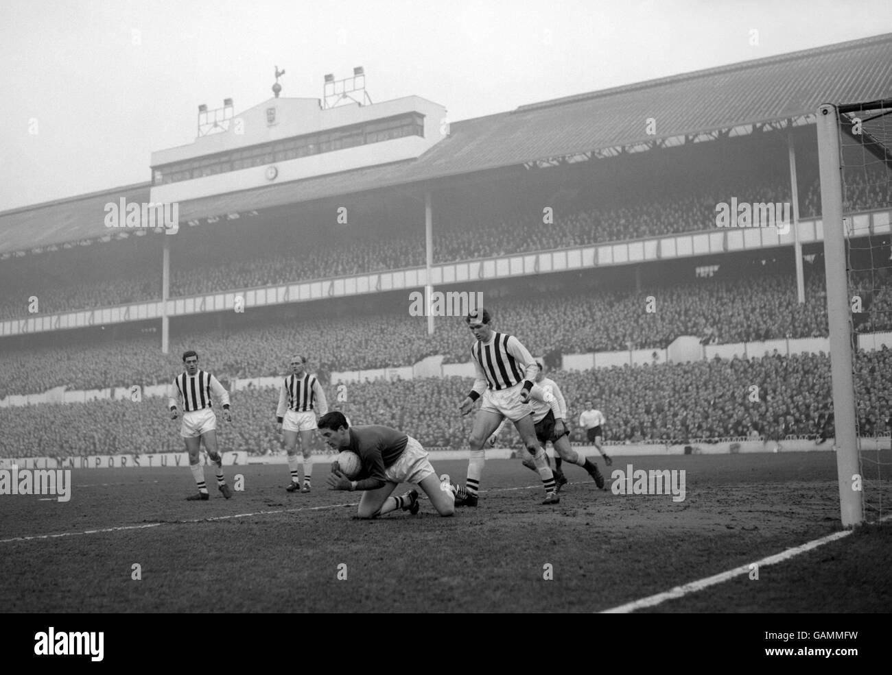West Bromwich Albion goalkeeper Ray Potter is seen here supported by ...
