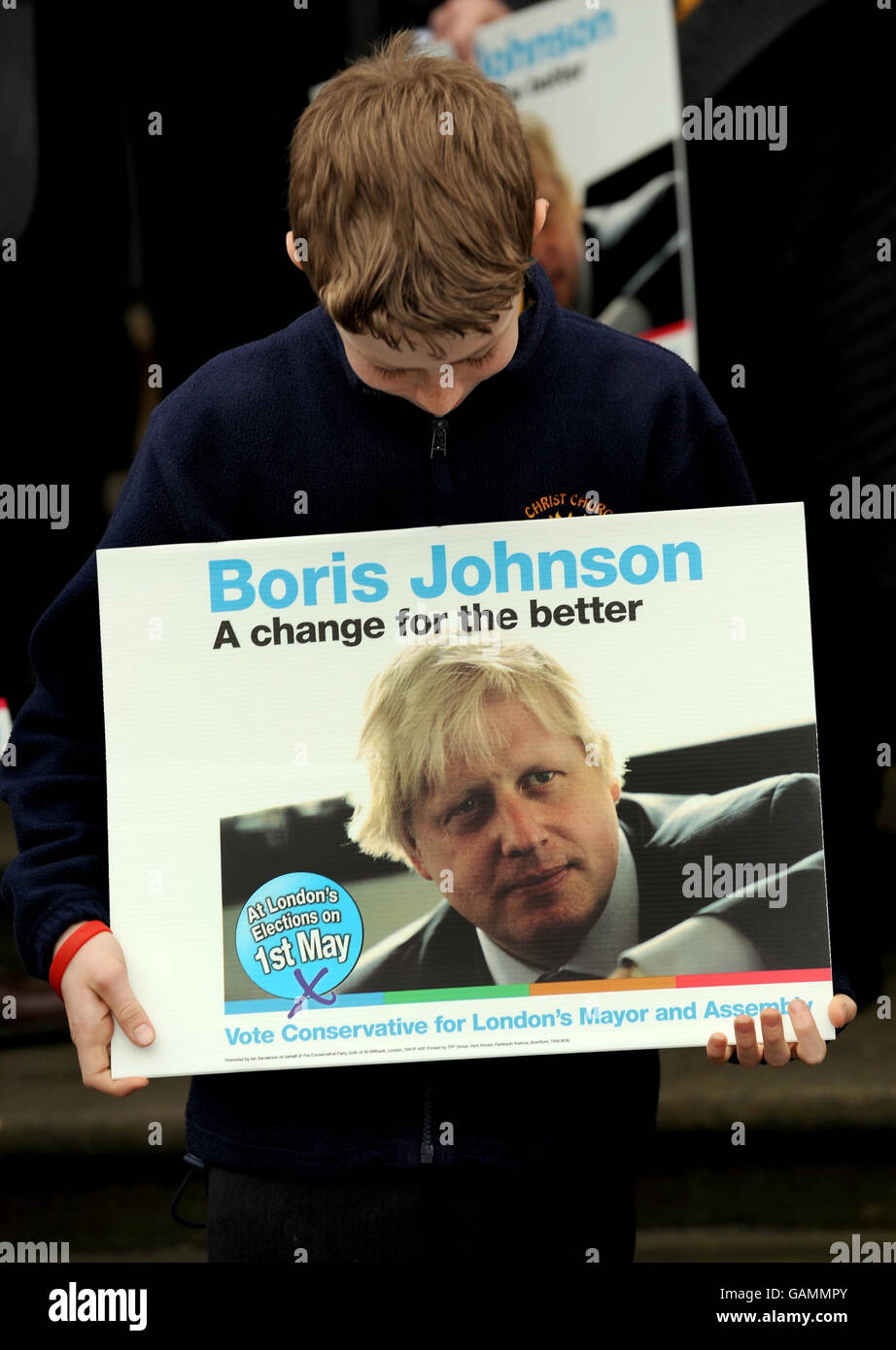 11-year-old Joseph Mallett holds a sign supporting Boris Johnson as ...