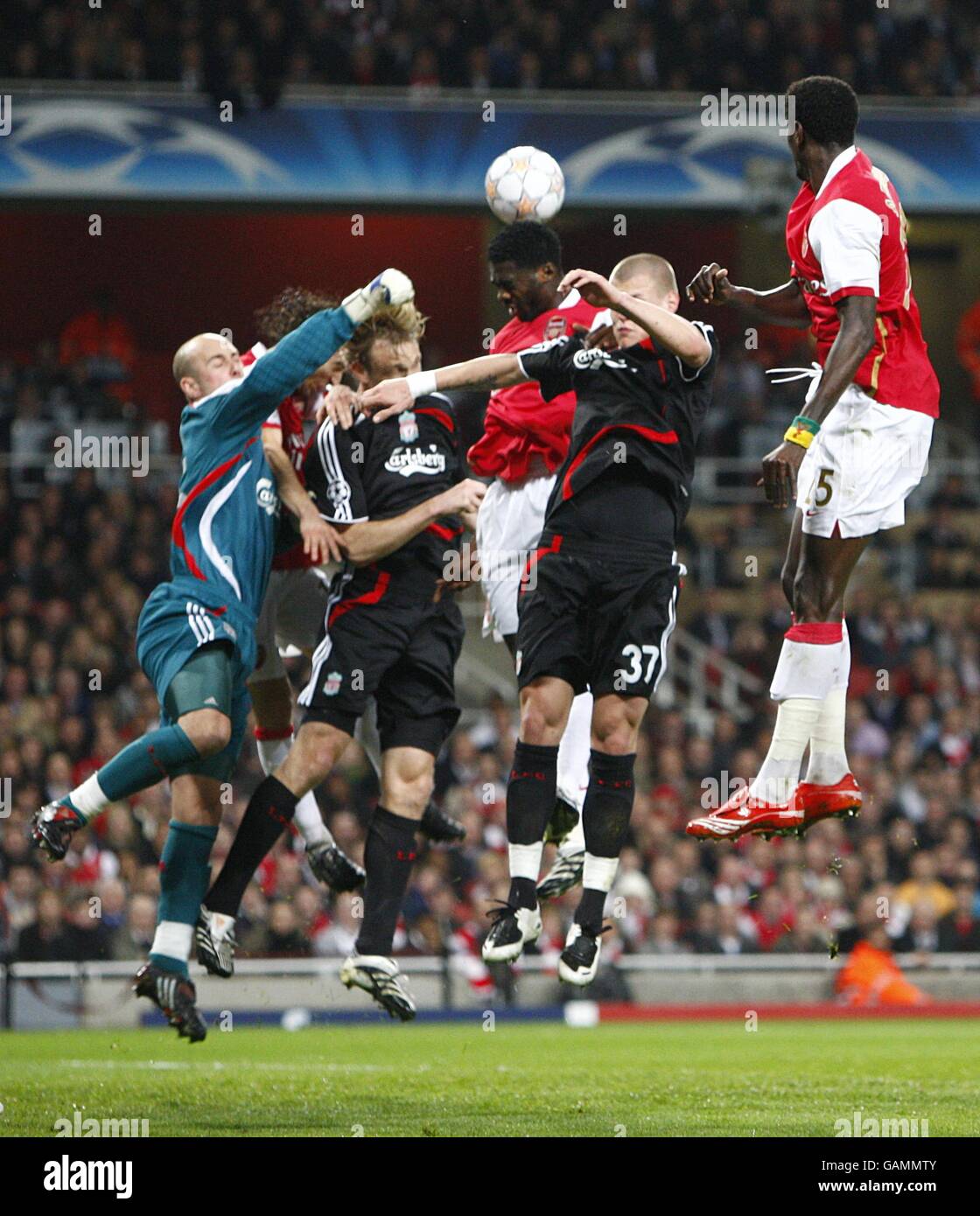 Arsenal's Emmanuel Adebayor (3rd r) and Kolo Toure (r) challenge ...