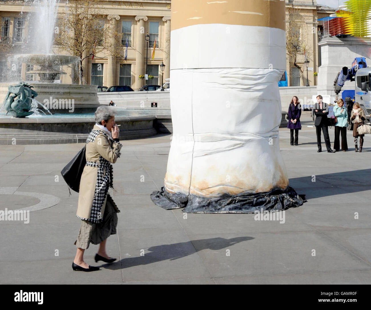 A giant imitation cigarette butt in London's Trafalgar Square, to ...