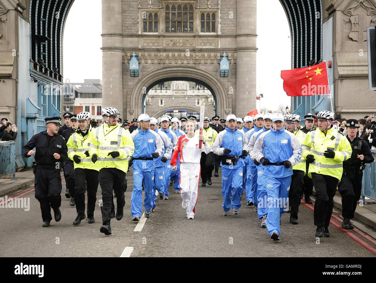 Paula Radcliffe carries the Olympic Torch over Tower Bridge during the ...