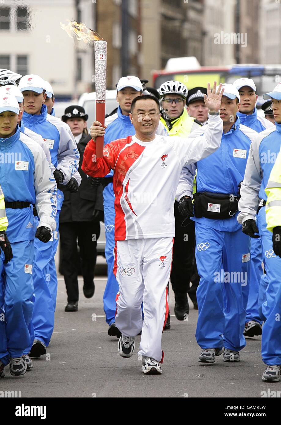 Beijing Olympics Torch Relay - London. The torch is carried towards ...