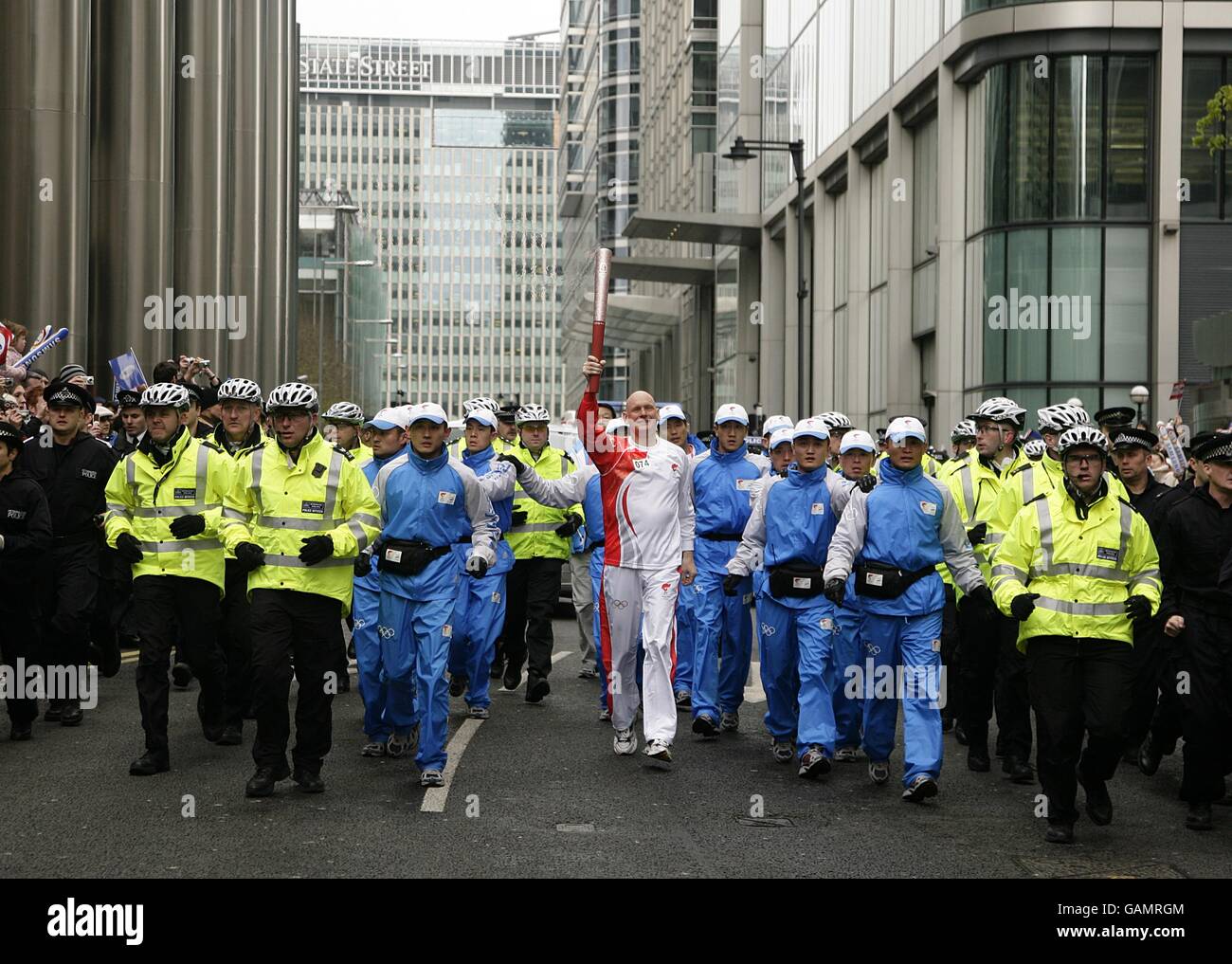 Beijing Olympics Torch Relay - London. Duncan Goodhew carries the torch ...