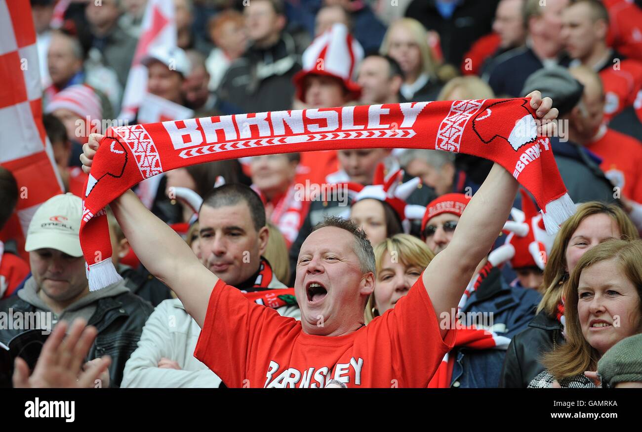 Barnsley fans enjoy the atmosphere in the stands prior to kick off ...
