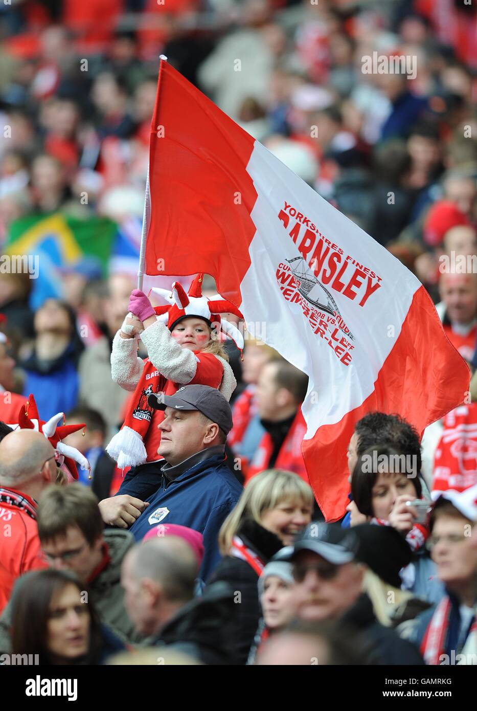 Barnsley fans enjoy the atmosphere in the stands prior to kick off ...