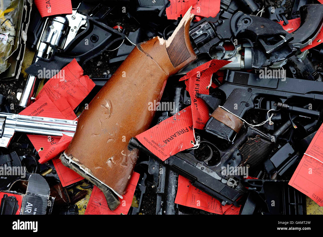 Imitation firearms crushed Stock Photo - Alamy