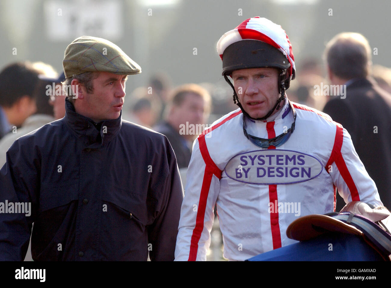 Horse Racing - Kempton Races. Jockey Mick Fitzgerald and trainer ...
