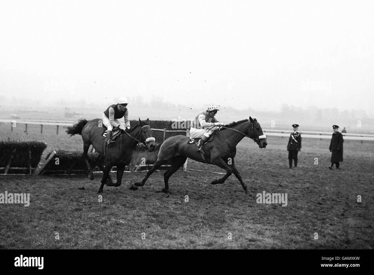 Leading over the last hurdle from the winner persian war hi-res stock ...
