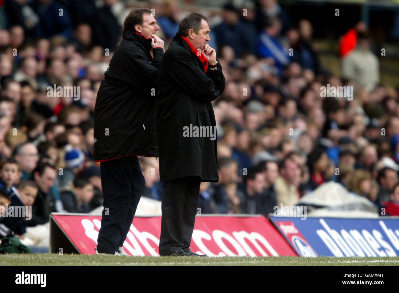 (L-R) Assistant manager Phil Thompson and manager Gerard Houllier ...