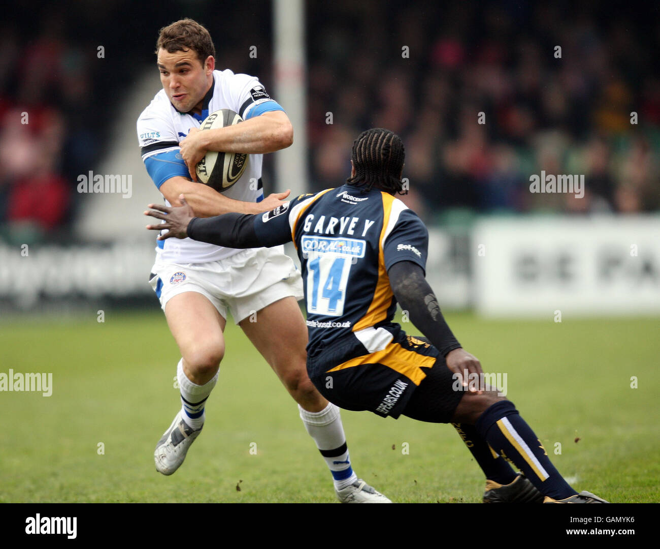 Bath's Olly Barkley steps inside Worcester's Marcel Garvey during the ...