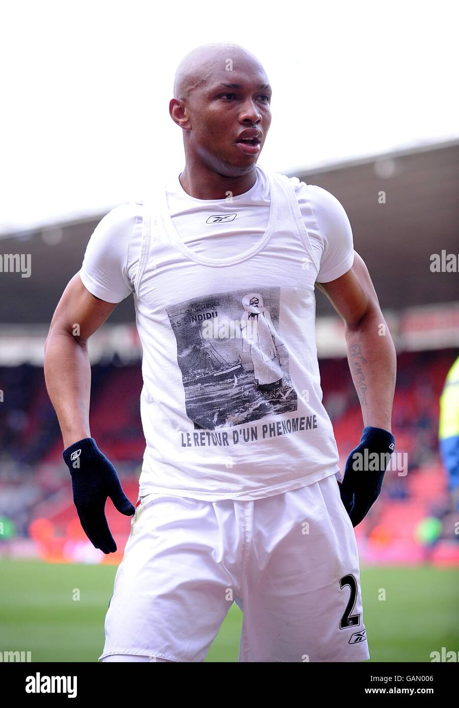 Bolton wanderers el hadji diouf celebrates after the final whistle hi ...