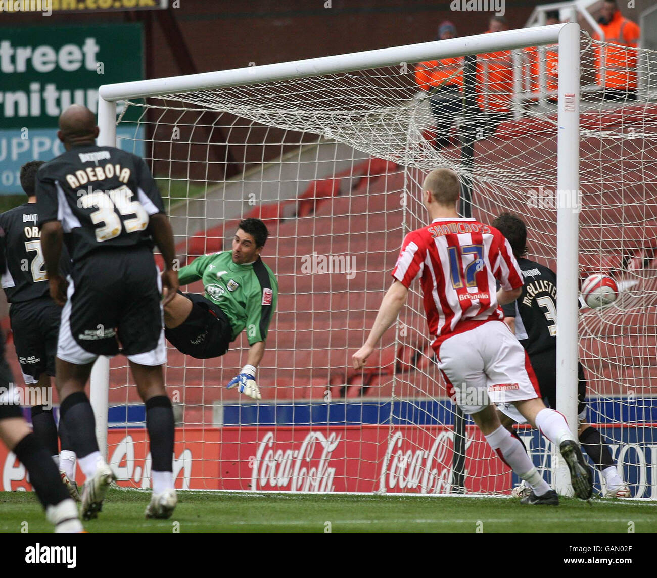 Bristol City's goalkeeper Adriano Basso fails to stop the goal from ...