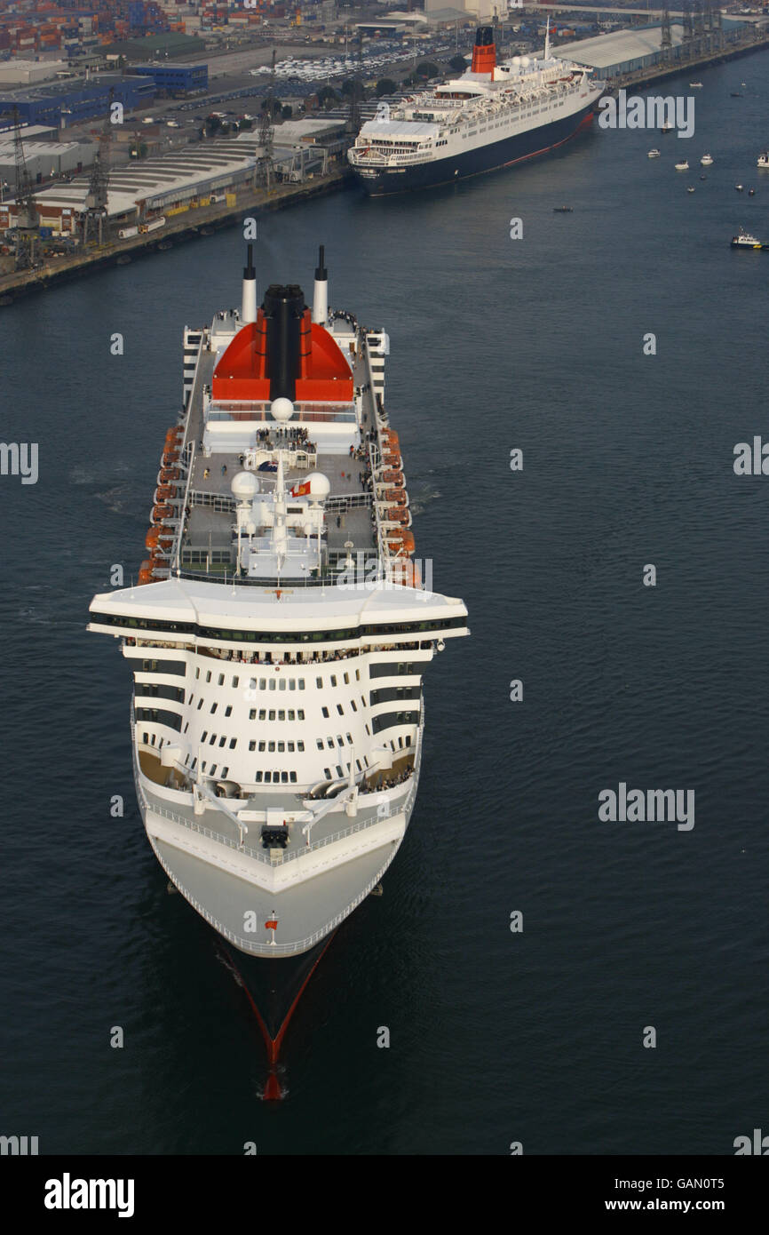 Cunard's Queen Mary II (nearest camera) steams past the Queen Elizabeth ...