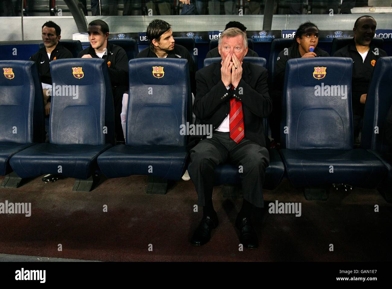 Manchester United manager Alex Ferguson sits on the bench prior to kick ...