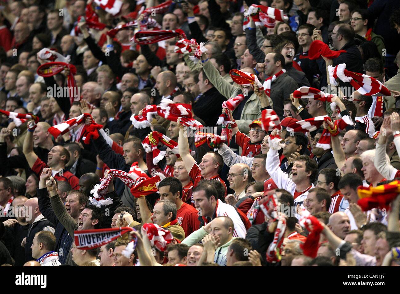 Liverpool fans cheer on their team hi-res stock photography and images ...