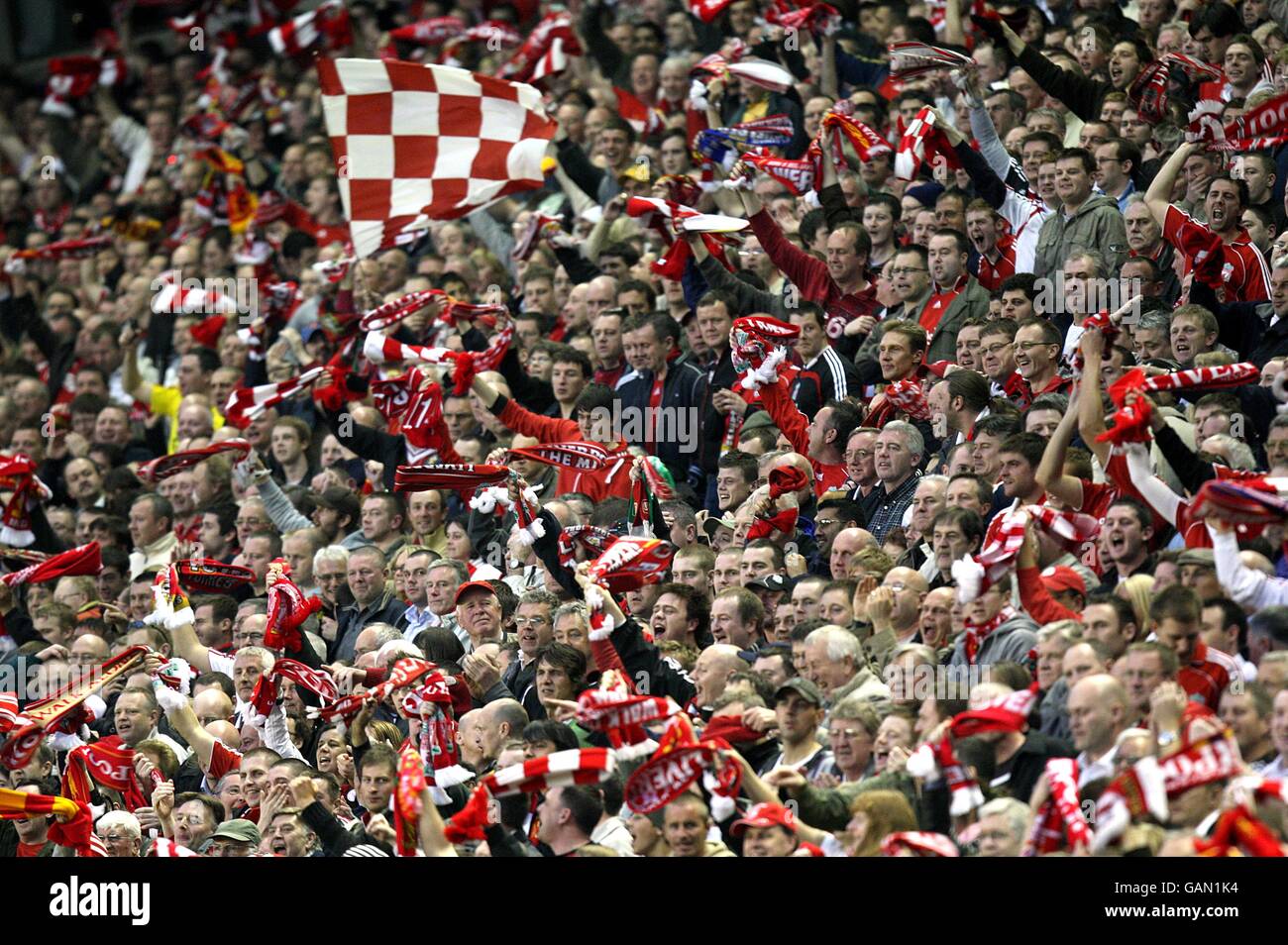 Chelsea fans cheer on their team hi-res stock photography and images ...