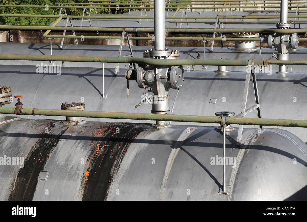 many steel safety valves over the container under full pressure of ...