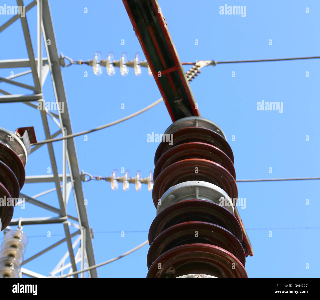 large electric switch viewed from below in an electrical substation ...